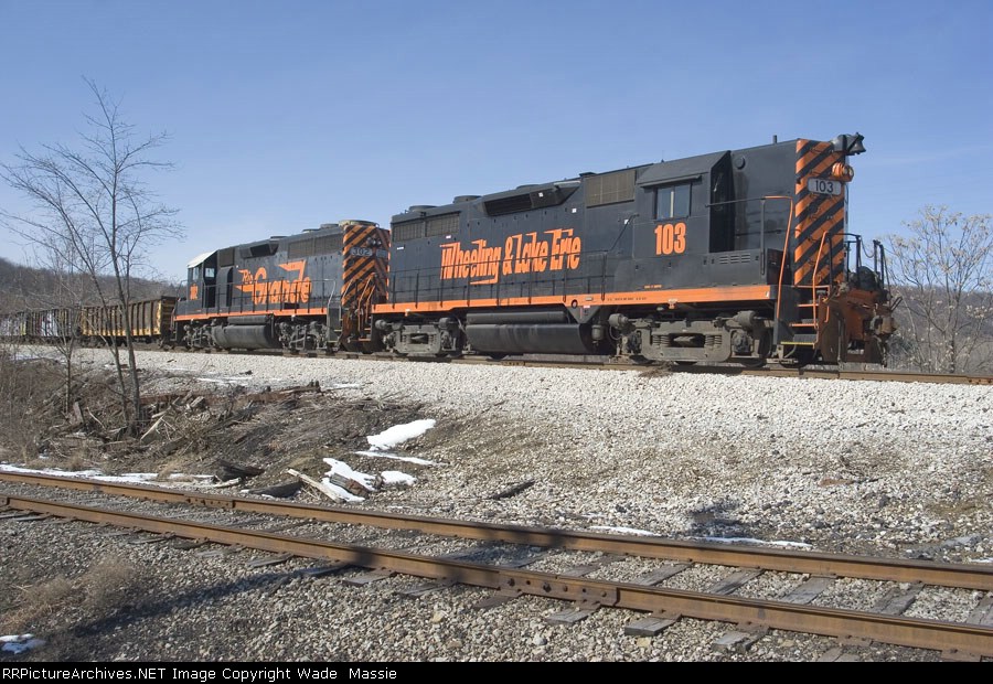 WE 103 and another geep working as a helper set on a westbound slab train